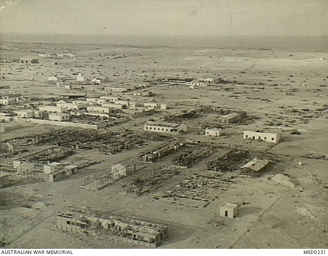 Ruined buildings in a part of Tobruk which suffered heavily from the ...