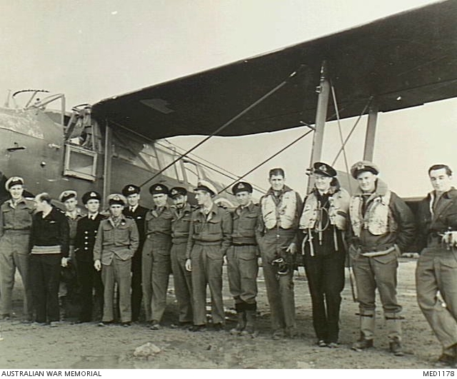 Group portrait of pilots of the Fleet Air Arm with one of the Albacore ...