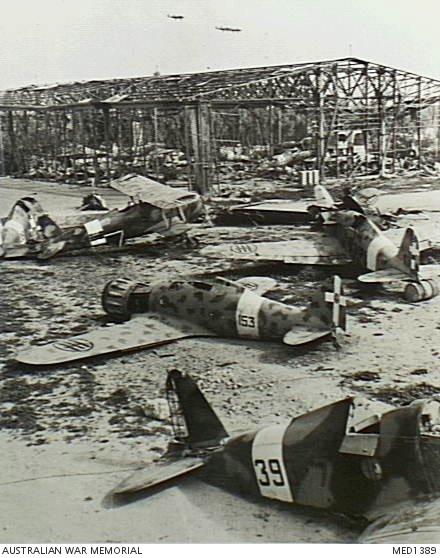 Tripolitania, Libya. 10 March 1943. Allied aircraft fly over a smashed ...
