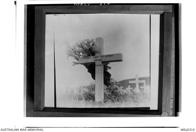 Cross marking the grave of 3484 Captain (Capt) Garth George Jarman, of ...