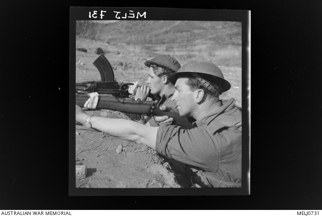 Sharing a weapon pit during field training in Korea are 27798 Private ...