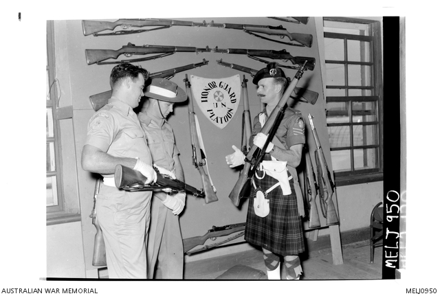 Chrome plated rifles are used on ceremonial parades in Korea by men of ...