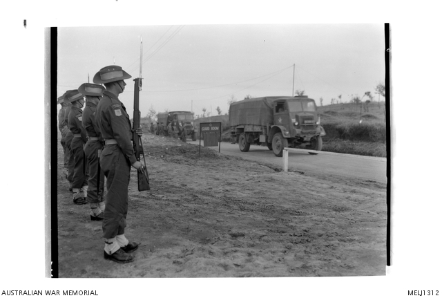 The 1st Battalion, The Royal Australian Regiment (1RAR), receives a ...