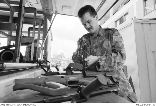 Armament fitter Craftsman Allister Coney, serving in Rwanda, repairing ...