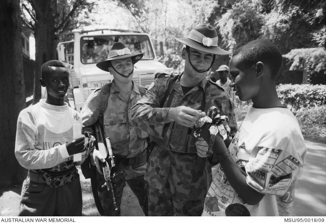 Rwanda. 1995-01-17. Taking a look at some watches some very keen ...