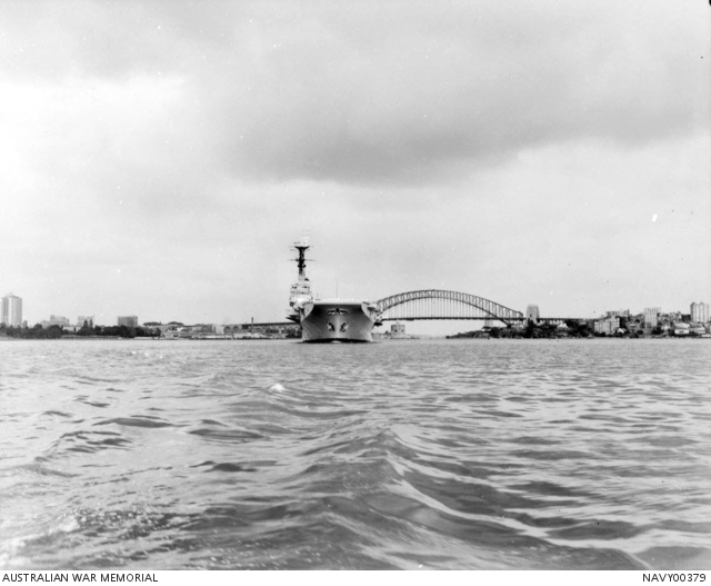 The aircraft carrier HMAS Melbourne, steaming towards the heads on her ...