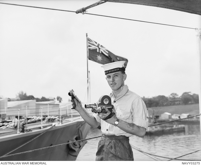 Naval Airman Photographer Ronald Batchelor of Nowra, NSW takes a light ...