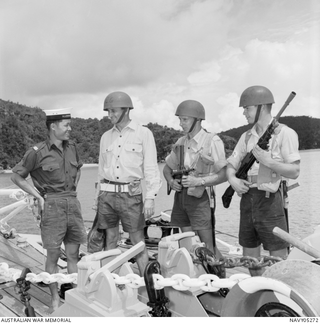 An armed boarding party assembles onboard the Ton class minesweeper ...