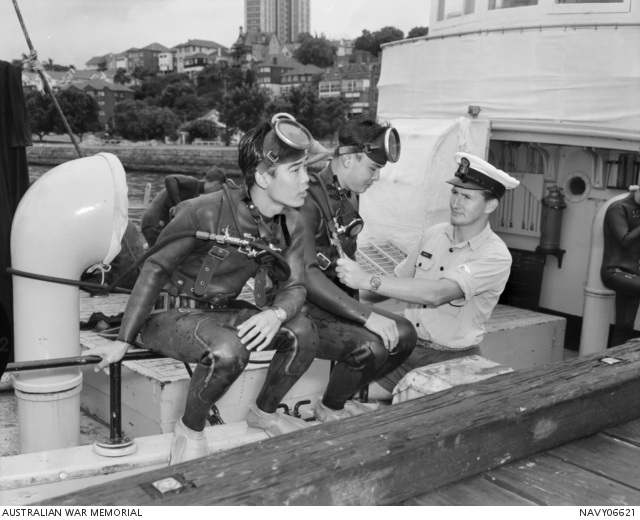 Two young Malaysian naval officers undergoing instruction during a six ...