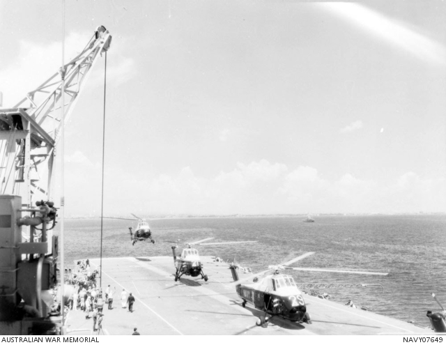The aircraft carrier HMAS Melbourne sails from Manila Bay to ...