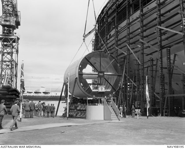 Officials observe the first hull section of the Australian Oberon class ...