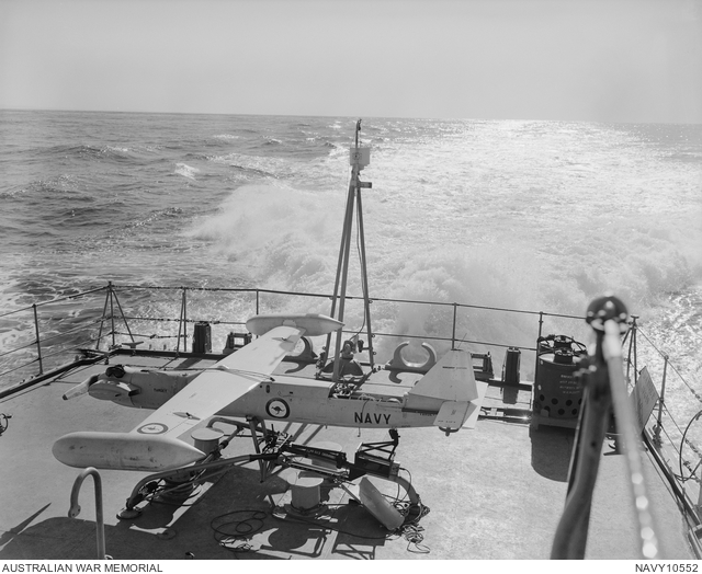 A Pilotless Target Aircraft (PTA) readied for launch from the quarter ...