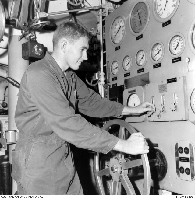 Engine Room Artificer 3rd Class J E Cunningham, R42664 operates the ...