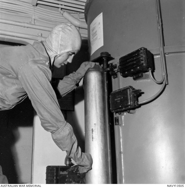 Ordinary Seaman K M Sherwin, R65592 loads B drum with a powder ...