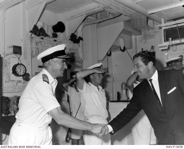 The Fleet Commander, Rear Admiral R I Peek (left), greets his Minister ...