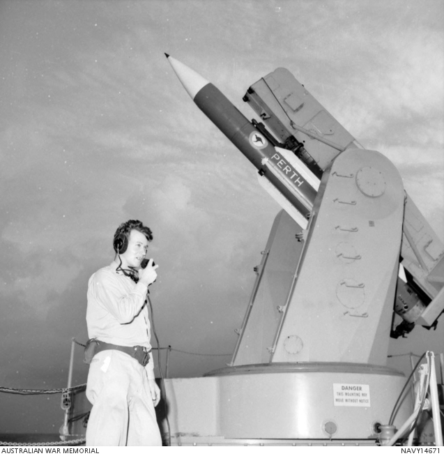 The RAN guided missile destroyer HMAS Perth (II) D38 is engaged in ...