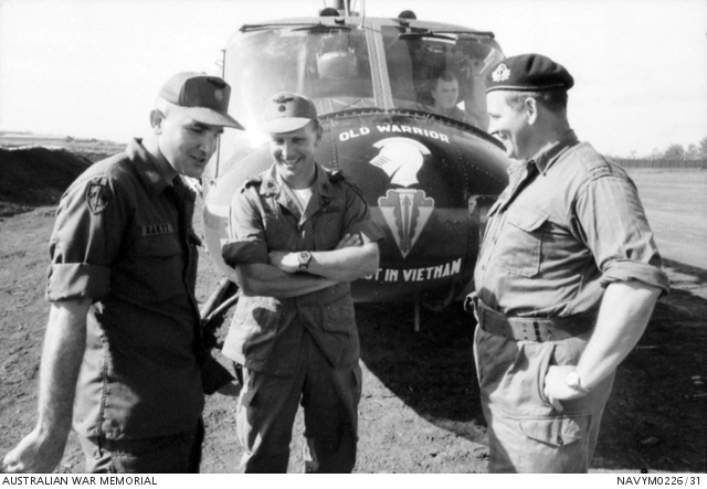 Informal portrait of members of the US Army 135th Assault Helicopter ...