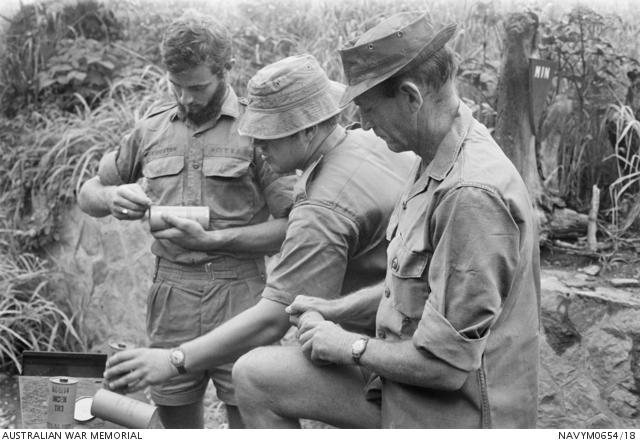 Members of the 7th Contingent, RAN Clearance Diving Team 3 (CDT3) work ...