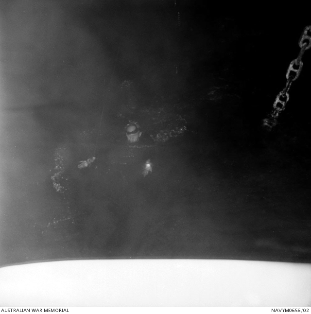 An unidentified member of the 7th Contingent, RAN Clearance Diving Team ...