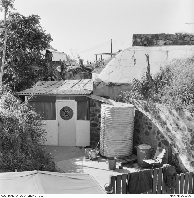 Sheds and a water tank at a base of the RAN Clearance Diving Team 3 ...
