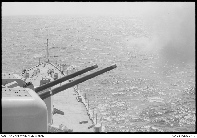 Guns firing on HMAS Vendetta. | Australian War Memorial