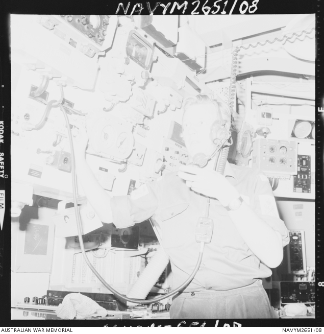 Crew member aboard HMAS Vampire. | Australian War Memorial