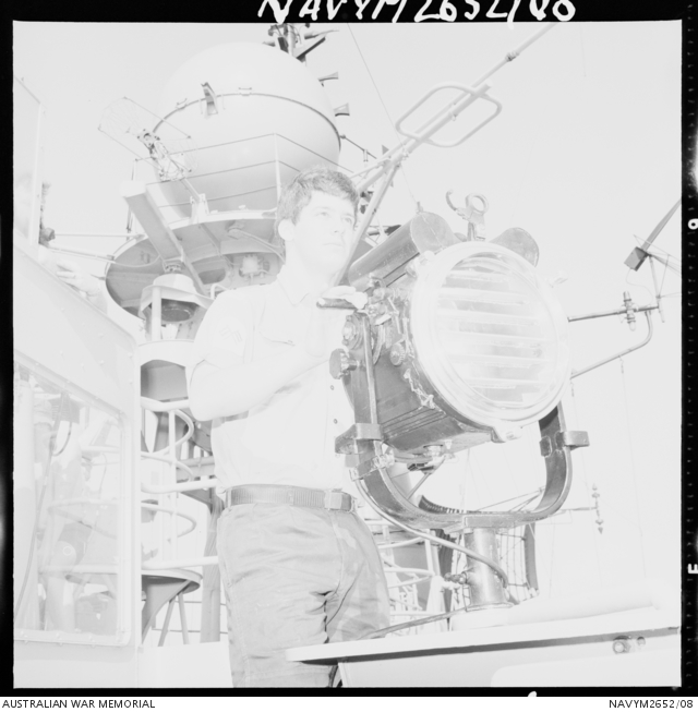 Crew member aboard HMAS Vampire. | Australian War Memorial