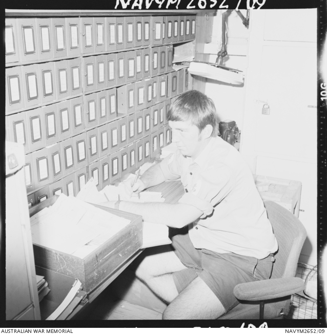 Crew member aboard HMAS Vampire. | Australian War Memorial