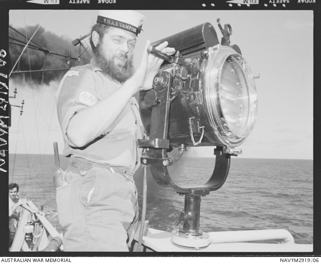 Signaller aboard HMAS Vampire. | Australian War Memorial