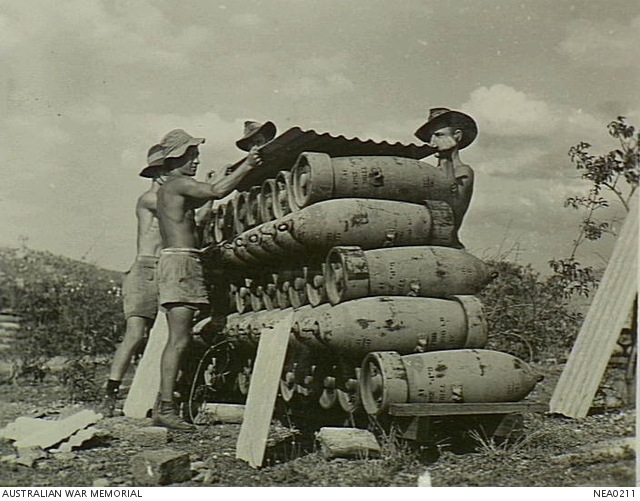 North Qld. RAAF 250lb bombs are stored temporarily in the open air ...