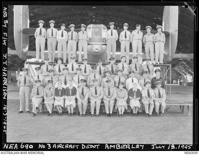 Amberley, Qld. 1945-07-18. Group portrait of Officer Staff of No. 3 ...