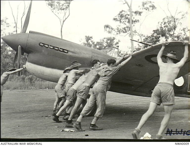 Livingstone, NT. 20 January 1943. Seven ground staff members of No. 77 ...