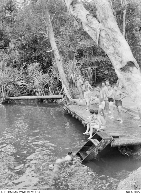 Berry Springs, NT. February 1943. Members of the RAAF cool off with a ...