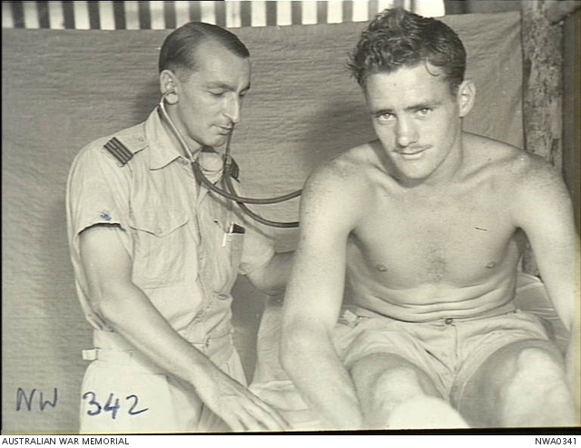 Darwin area, c. June 1943. An airman undergoing a chest examination by ...
