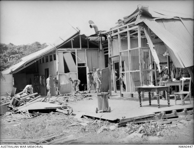 Darwin area, NT. c. February 1942. Repairing the ruined buildings ...