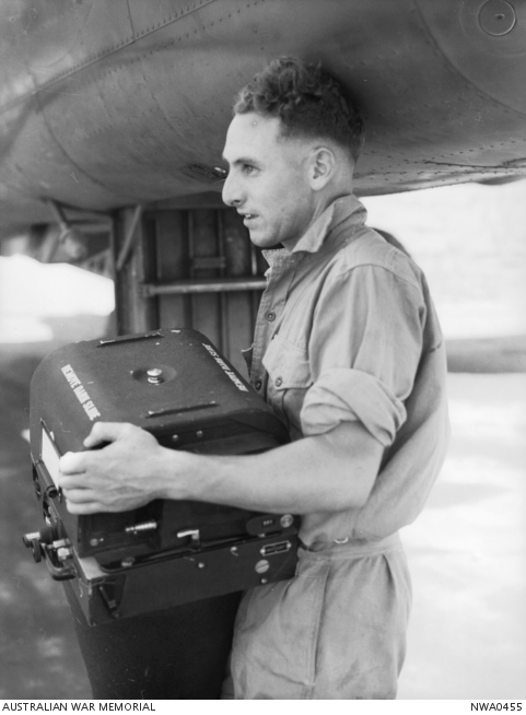 Sergeant Norman Harvey, a photographer of No. 1 (Photographic Reconnaissance) Squadron RAAF ...