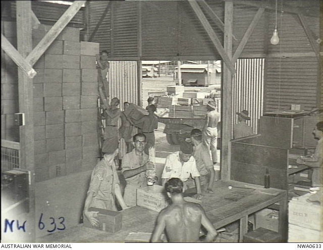 Darwin, NT. c. 1945. Supplies being loaded on a truck at a RAAF bulk store for delivery to RAAF ...
