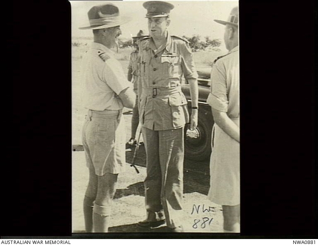 Darwin, NT. 1945-03-18. Greeting Lord Wakehurst (centre) on his arrival ...
