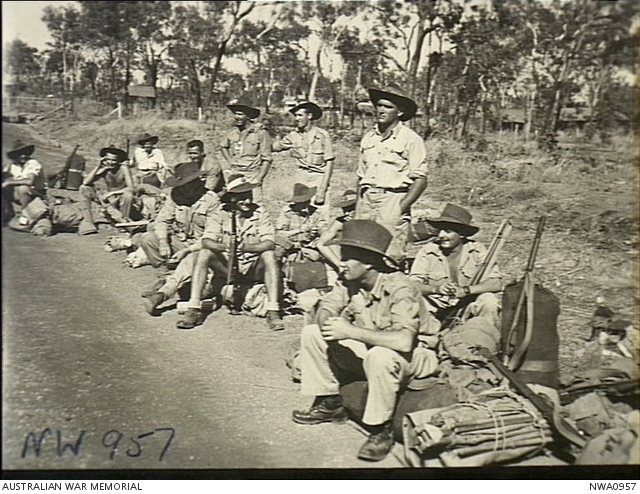 Darwin, NT. 1945-06-16. Members of No. 82 (HB) Wing RAAF waiting on the ...