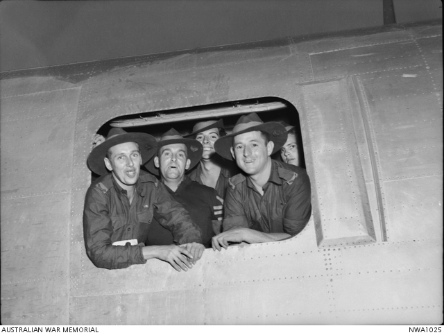 Darwin, NT. 1945-09. Newly repatriated AIF prisoners of war (POWs) get ...