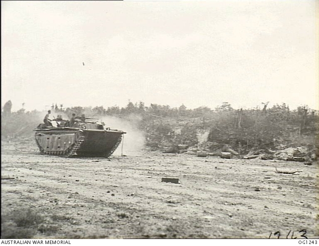 NOEMFOOR ISLAND, DUTCH NEW GUINEA. C. 1944-06-24. A US TANK CLEARING ...
