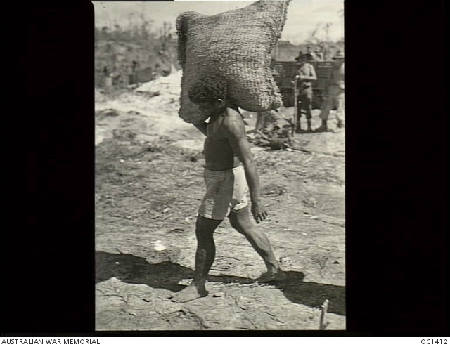 NOEMFOOR ISLAND, DUTCH NEW GUINEA. C. 1944-07. A LOCAL JAVANESE NATIVE ...