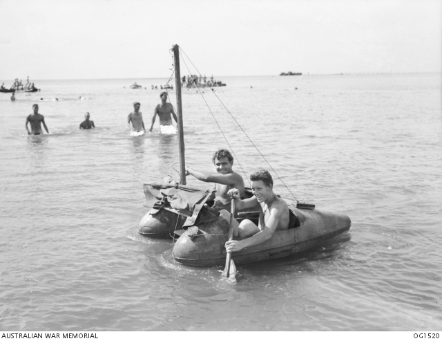 NOEMFOOR ISLAND, DUTCH NEW GUINEA. C. 1944-08. RAAF AIRMEN IN THE WATER ...