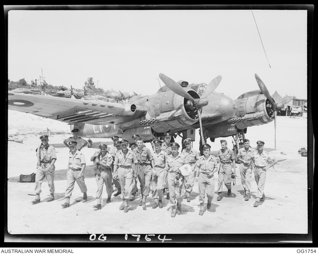 NOEMFOOR ISLAND, DUTCH NEW GUINEA. 1944-11-10. GROUP PORTRAIT OF PILOTS ...