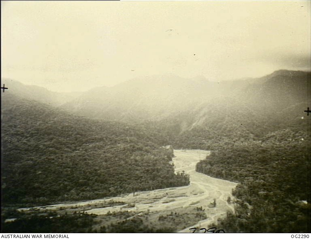 NORTH EAST NEW GUINEA. 1945-03-09. HEAVY RAIN CLOUDS HOVER OVER THE ...