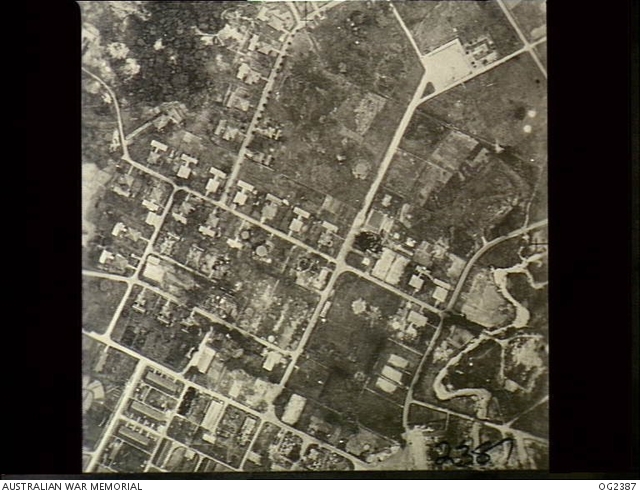 TARAKAN ISLAND, BORNEO. C. 1945-05. AERIAL PHOTOGRAPH OF PART OF ...
