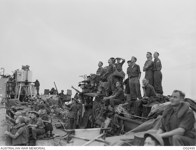 OFF TARAKAN ISLAND, BORNEO. 1945-05-01. RAAF PERSONNEL WATCH THE ...
