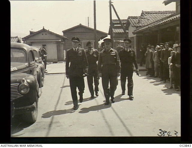 BOFU, JAPAN. C. 1946-04. LEAVING MITAJIRI RAILWAY STATION TO INSPECT ...