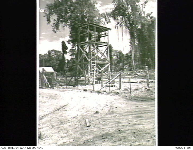 THE SOLOMON ISLANDS, 1945-10-18. WATCHTOWER AT THE JAPANESE INTERNMENT ...
