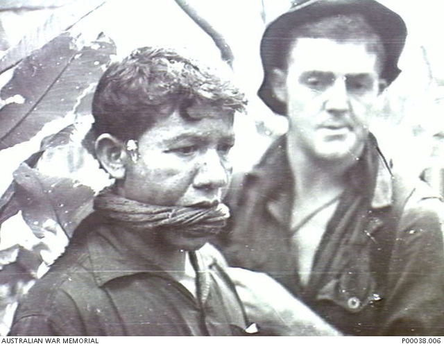 A Viet Cong (VC) soldier captured near Dat Do, now a prisoner and under ...